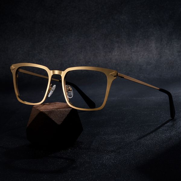 Gold Metal Frame Glasses With a Rectangle Shape